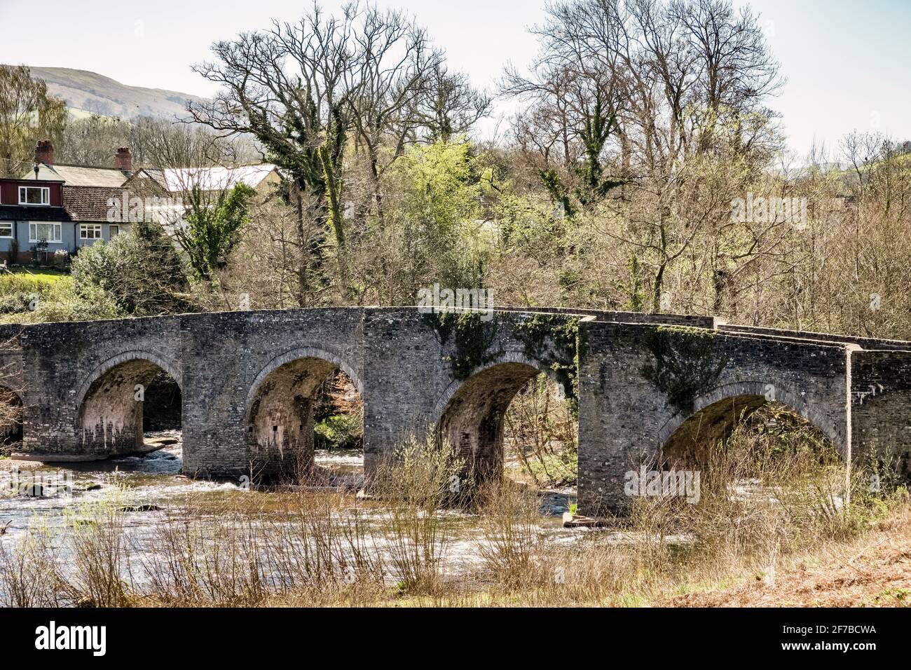The old stone bridge across the River Usk at Llangynidr, built around ...
