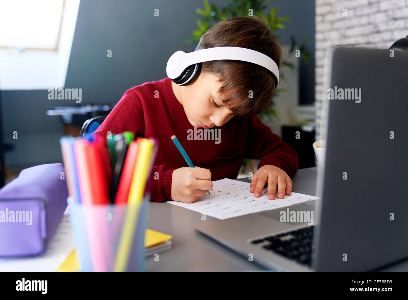 Schoolboy with brown hair hi-res stock photography and images - Alamy