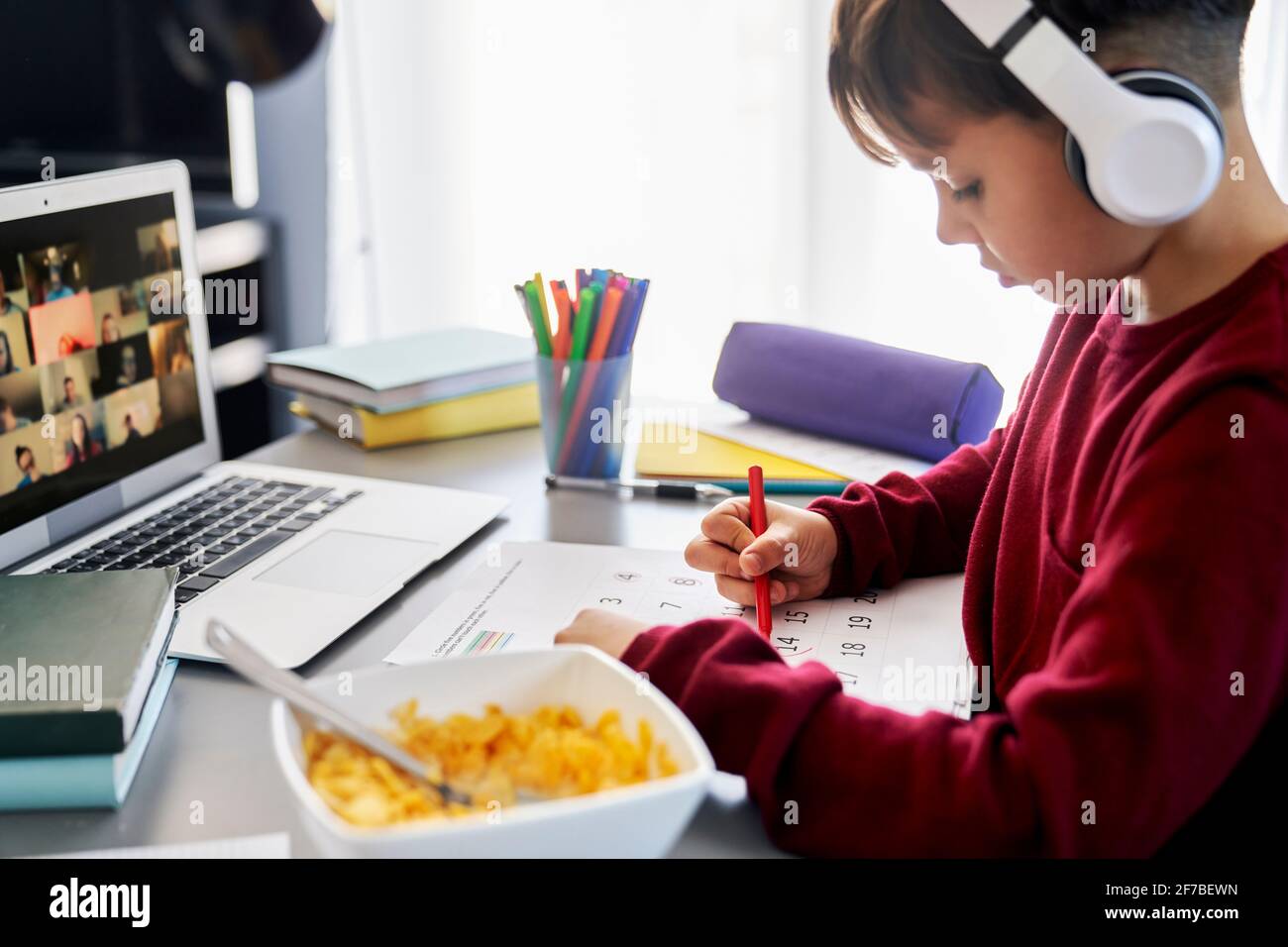 Back view schoolboy in hi-res stock photography and images - Alamy