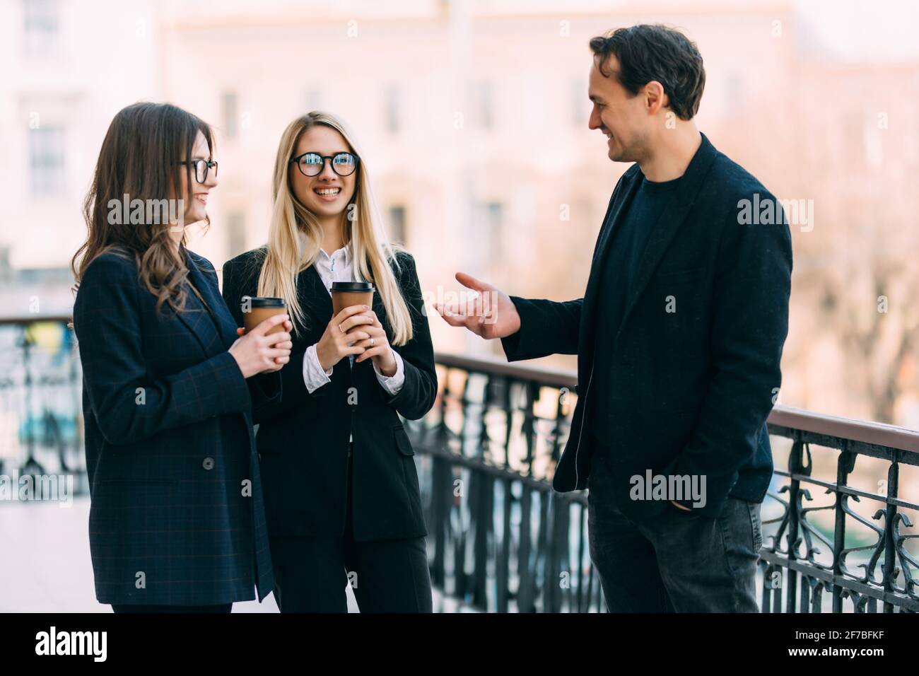 Happy work team during break time in office Stock Photo - Alamy