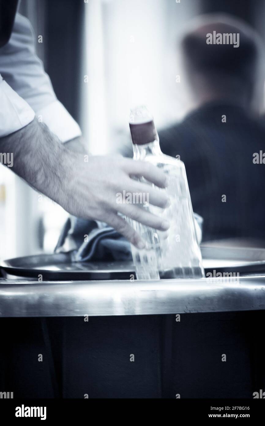 Empty alcohol bottle to be recycled. Transparent Stock Photo - Alamy