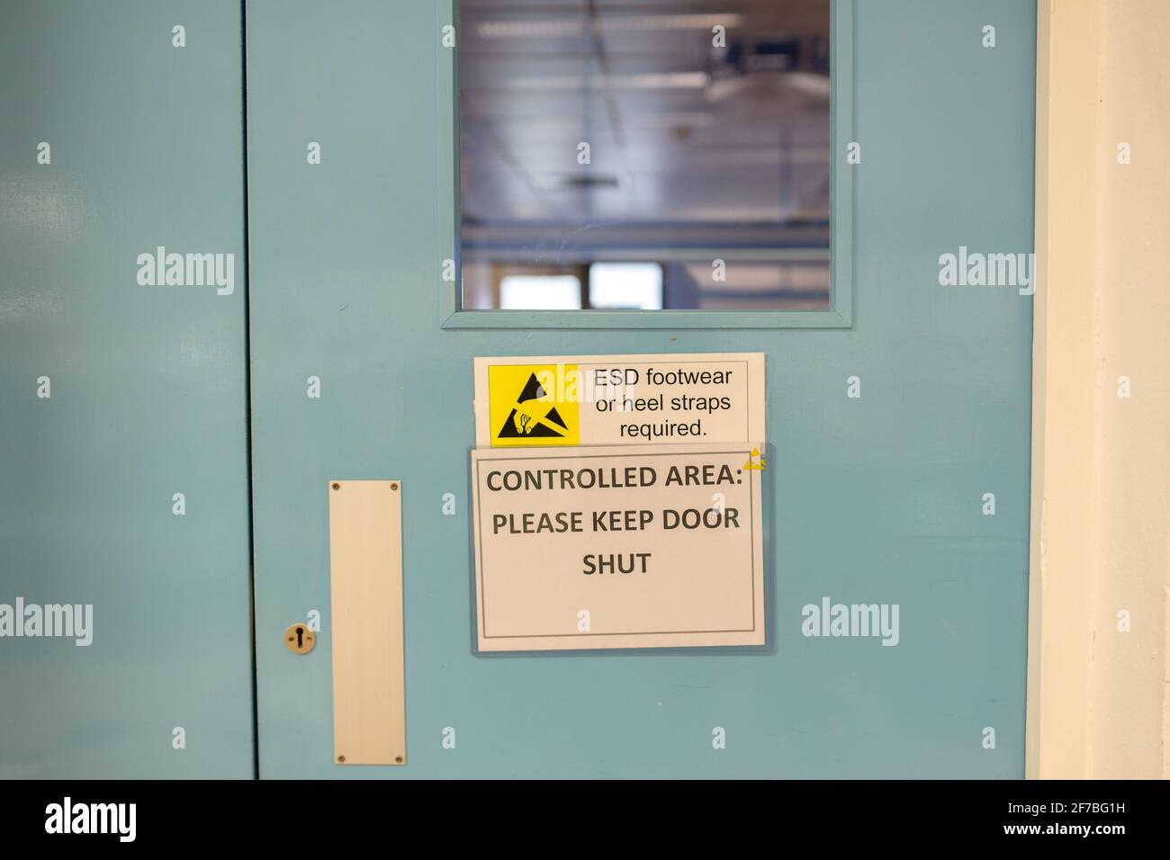 The door to a biological room in a medical manufacturers. Medical ...