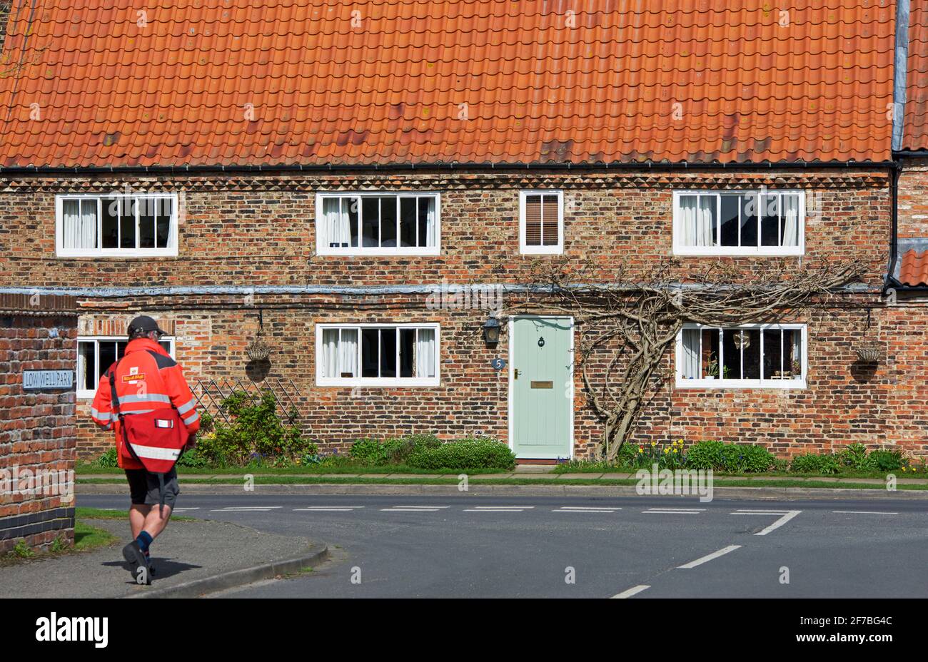 Royal Mail Postman On His Round High Resolution Stock Photography and ...