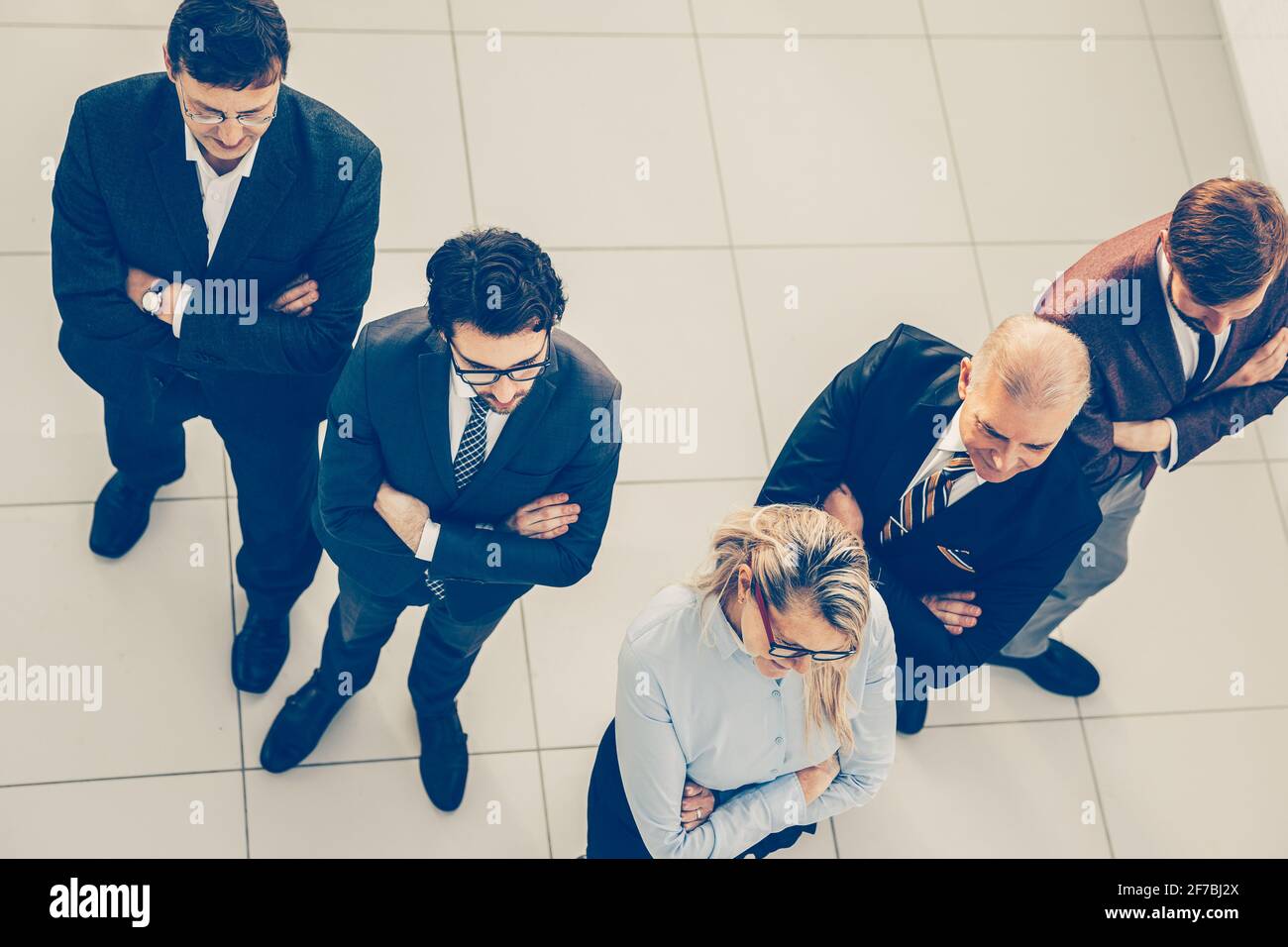 top view. confident business woman standing in front of her colleagues ...