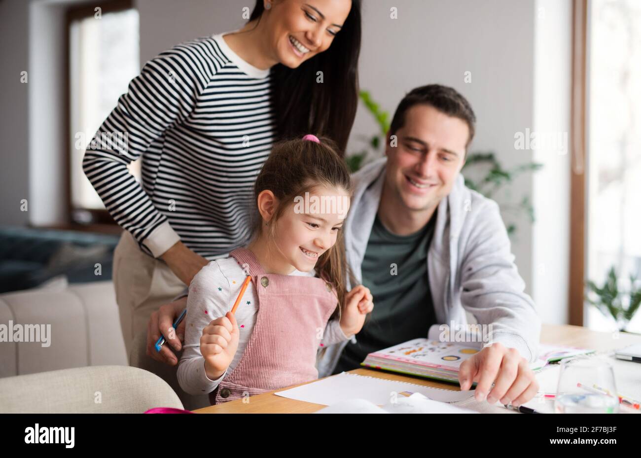 Working parents with their kids hi-res stock photography and images - Alamy