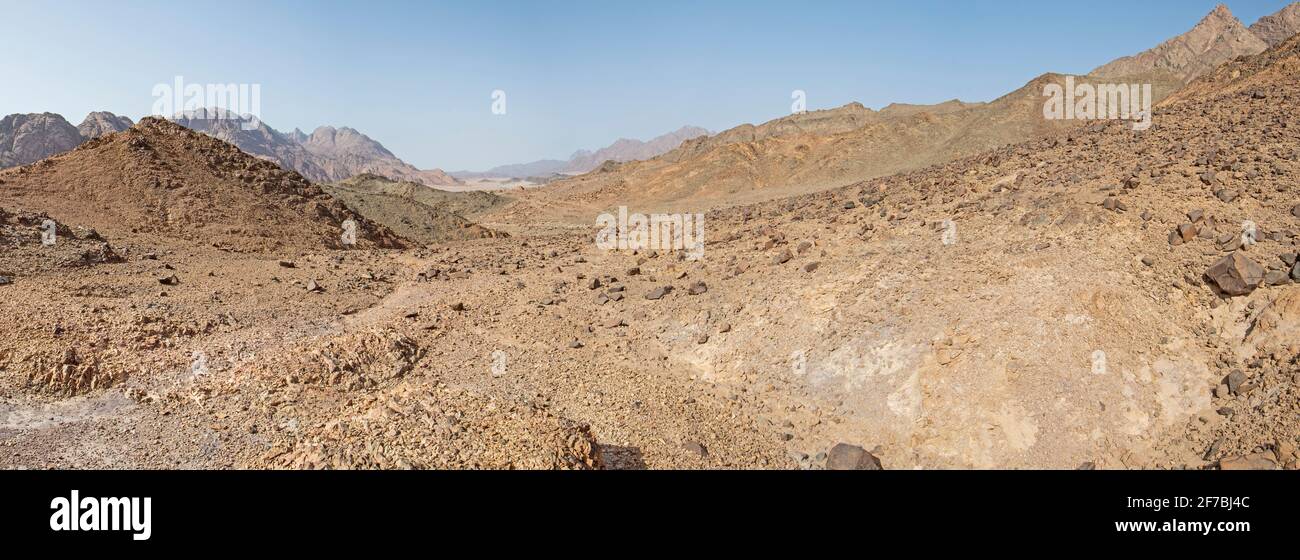 Rocky mountain slope landscape panorama in an arid desert environment ...