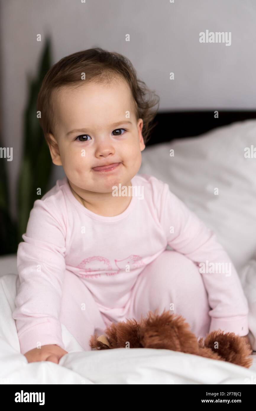 Authentic portrait caucasian little infant chubby baby girl or boy in ...