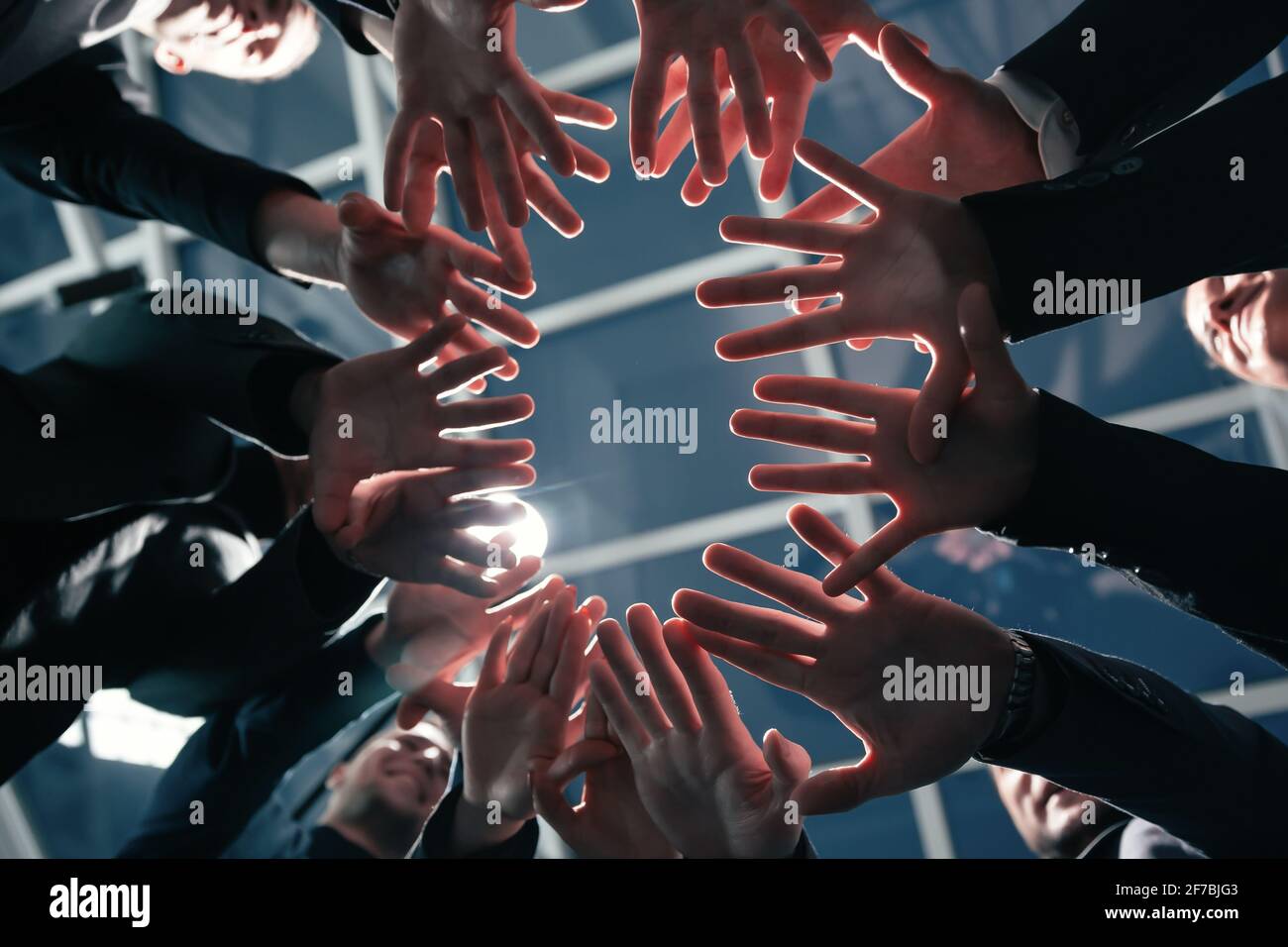 close up. young business team standing in a circle Stock Photo - Alamy