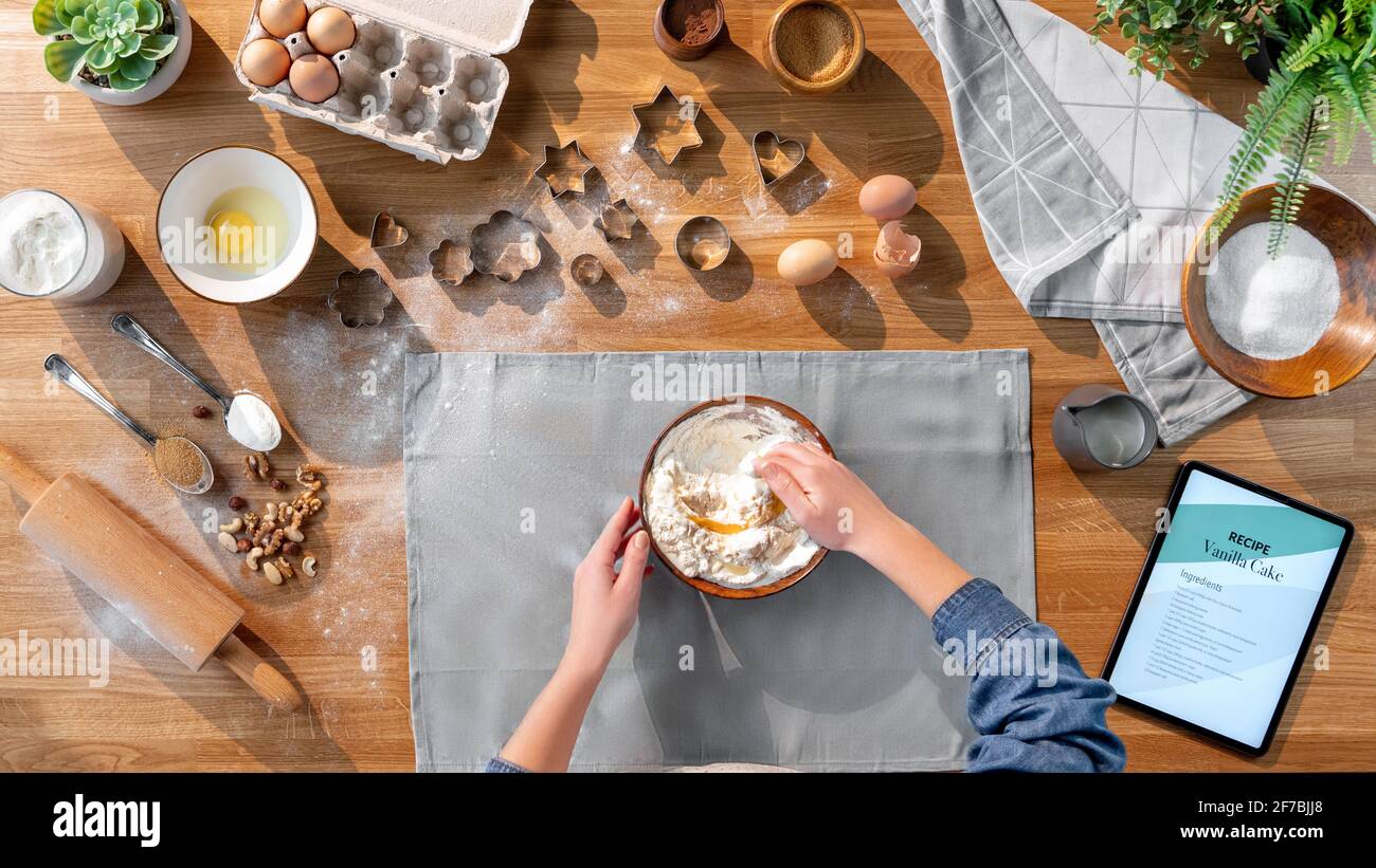 Top view of unrecognizable woman baking biscuits, desktop concept Stock ...