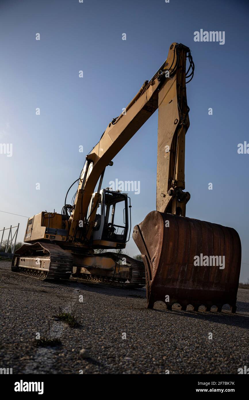 Excavator heavy machinery at construction site. Industrial concept ...