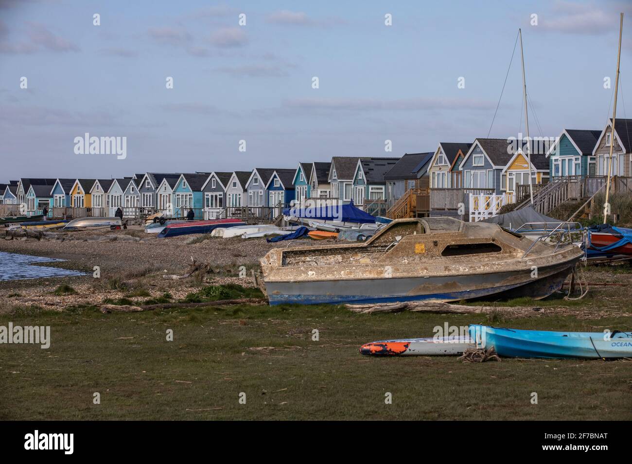 Mudeford Sandspit, stretch of sandbanks decorated with rows of beach ...