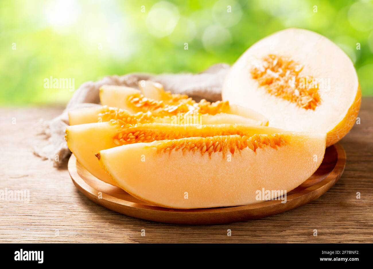 Fresh melon slices hi-res stock photography and images - Alamy