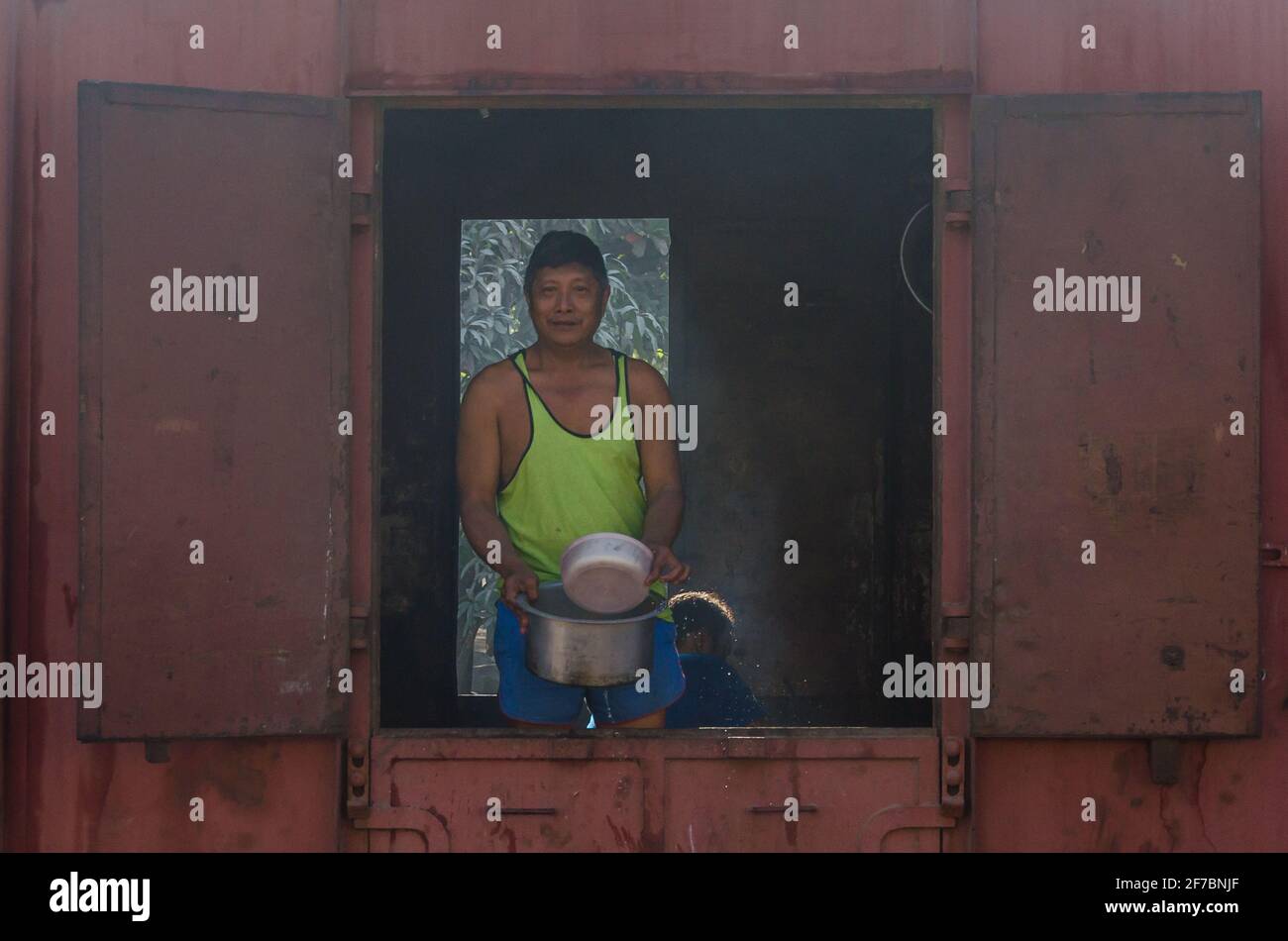 Passenger on a train from Yangon to Bago Stock Photo - Alamy