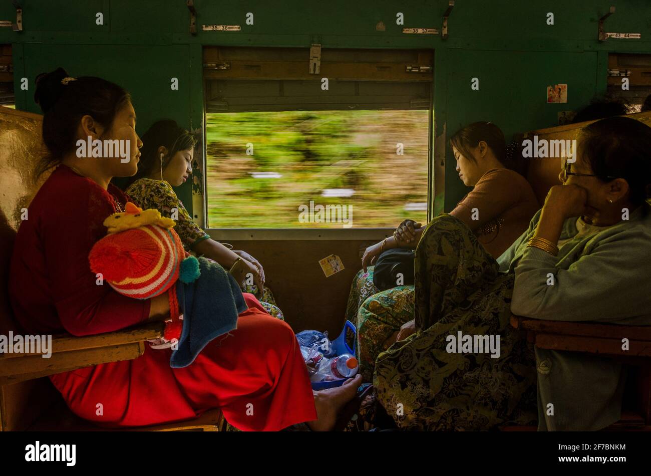 Passenger on a train from Yangon to Bago Stock Photo - Alamy