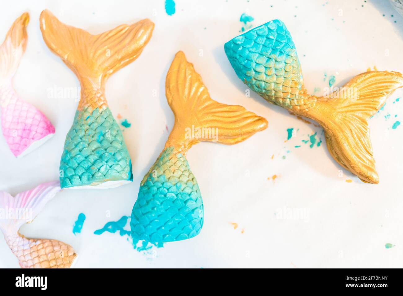Mermaid tails made out of modeling clay and painted with acrylic paint ...
