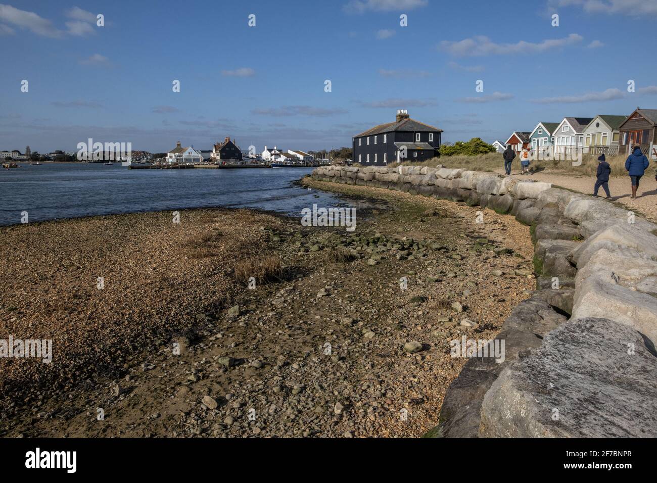 Mudeford Sandspit, stretch of sandbanks decorated with rows of beach ...