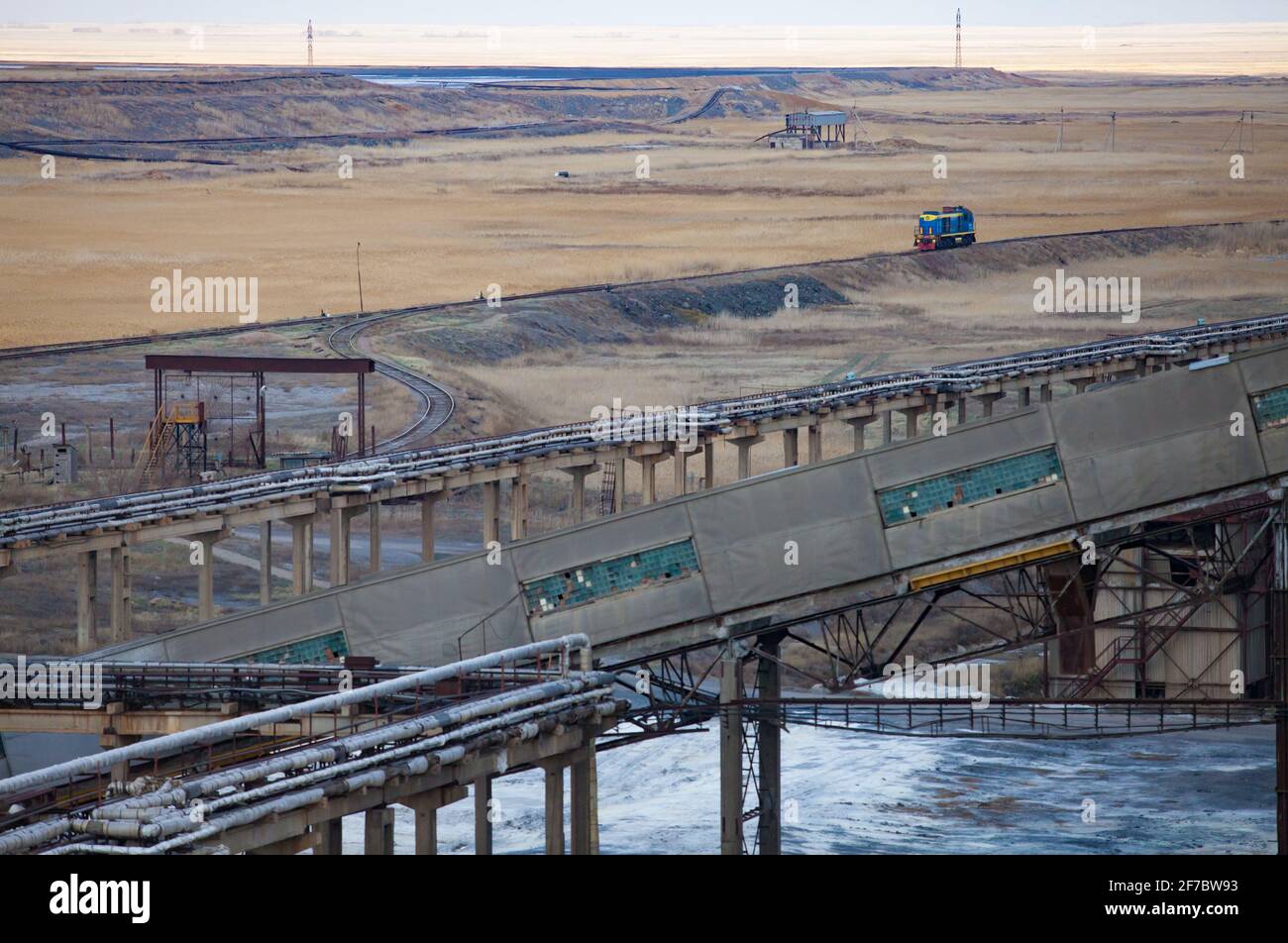 Outdated Soviet mining and processing plant. Pipelines, railroad and ...