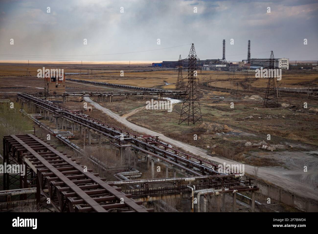 Outdated Soviet mining and processing factory. Panorama view. Pipelines ...