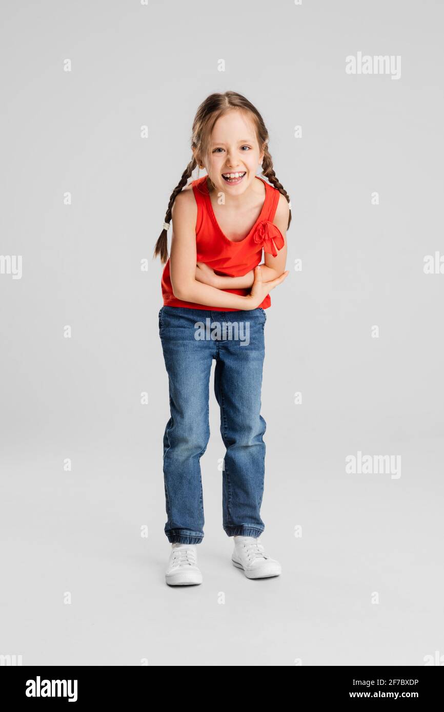Happy kid, girl isolated on white studio background. Looks happy ...