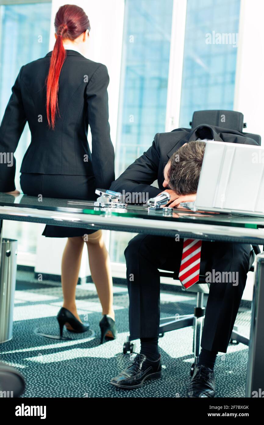 Business - nap in the office to relieve stress Stock Photo - Alamy