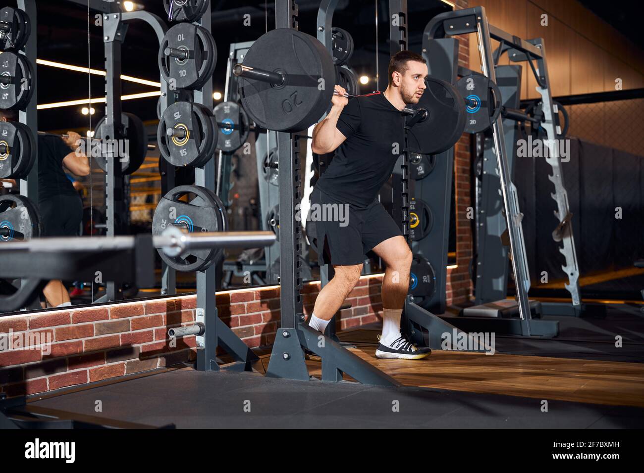 Athlete straining lifting weights hi-res stock photography and images ...