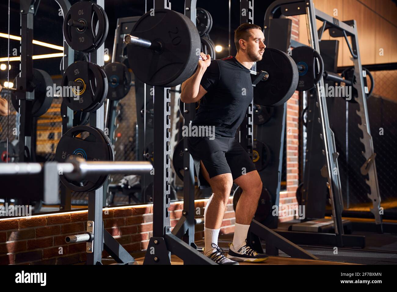 Athlete straining lifting weights hi-res stock photography and images ...