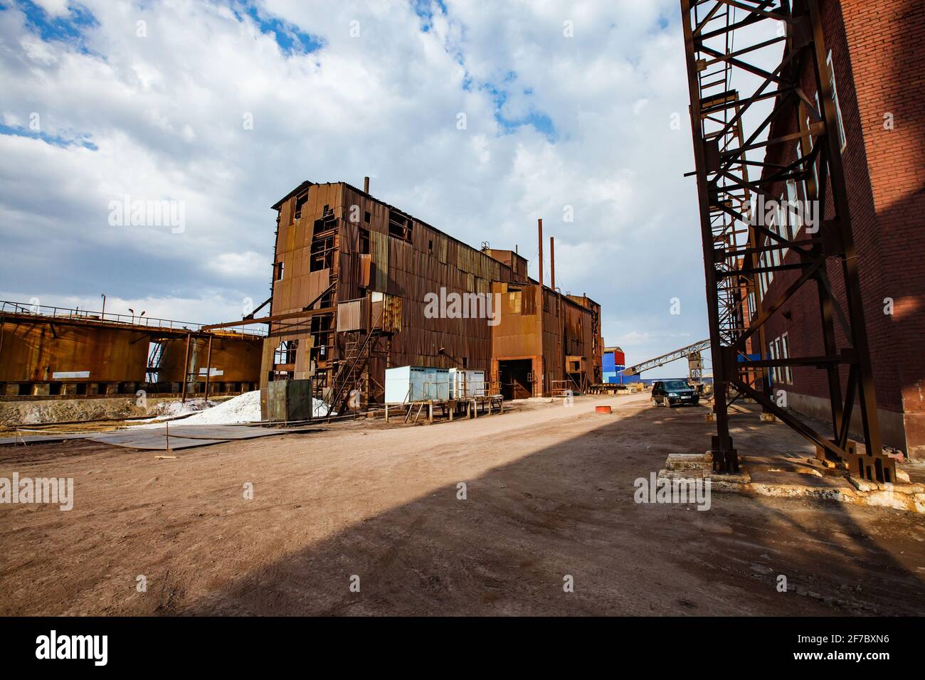 Demolition of outdated Soviet sulfuric acid plant. Outside view on ...