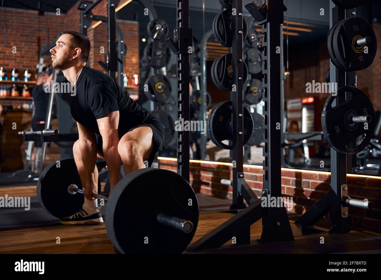 Athlete straining lifting weights hi-res stock photography and images ...