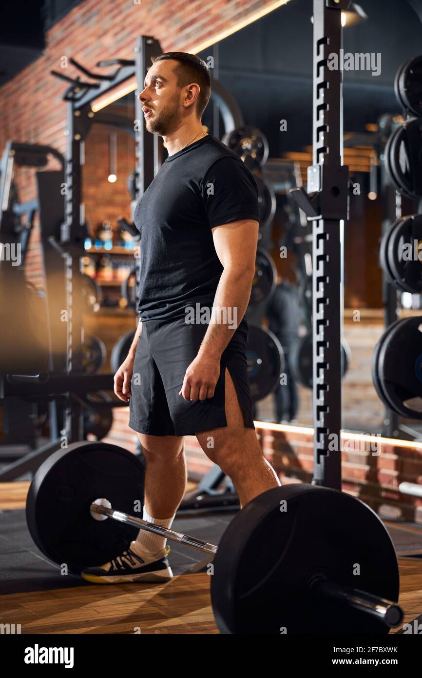Athlete straining lifting weights hi-res stock photography and images ...