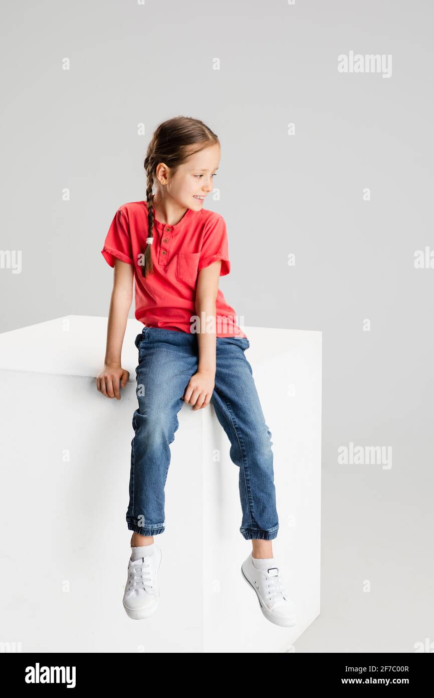 Happy kid, girl isolated on white studio background. Looks happy ...