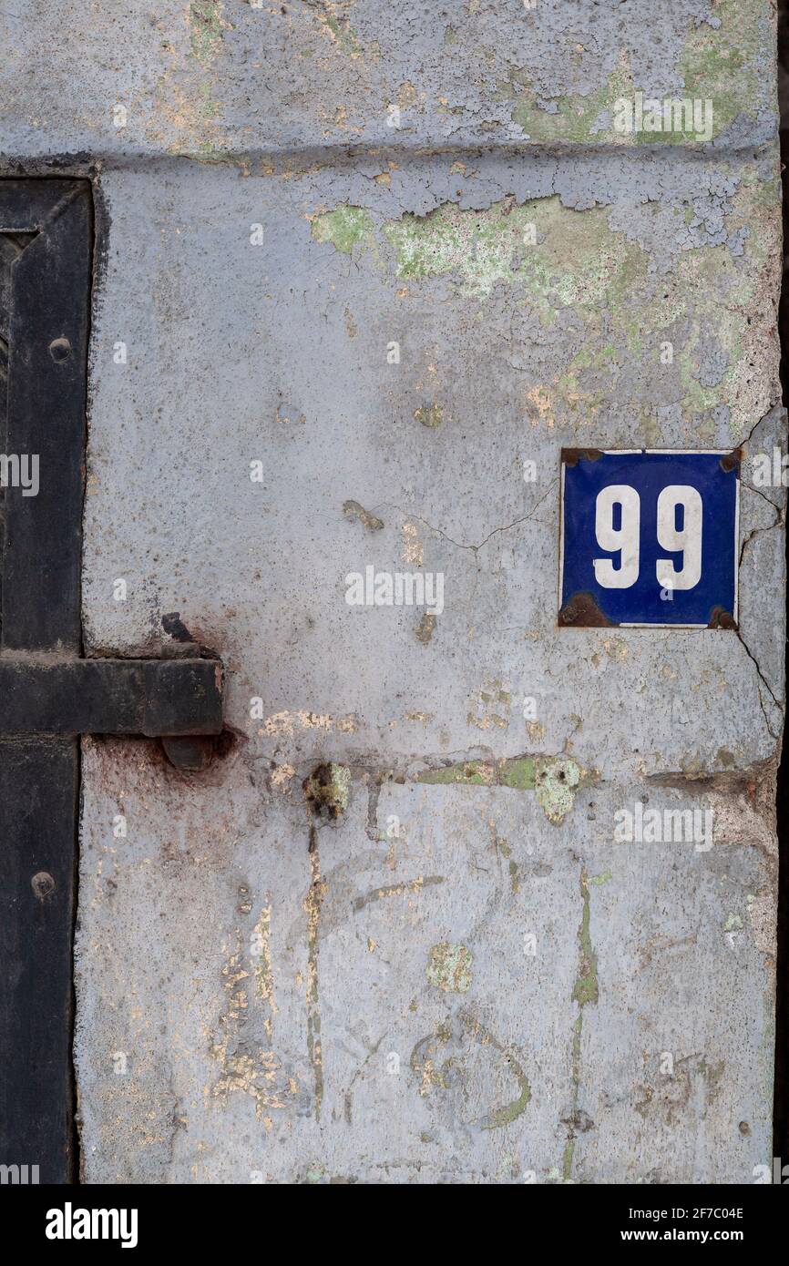 number 99, street number, house number, metal door on the left Stock ...