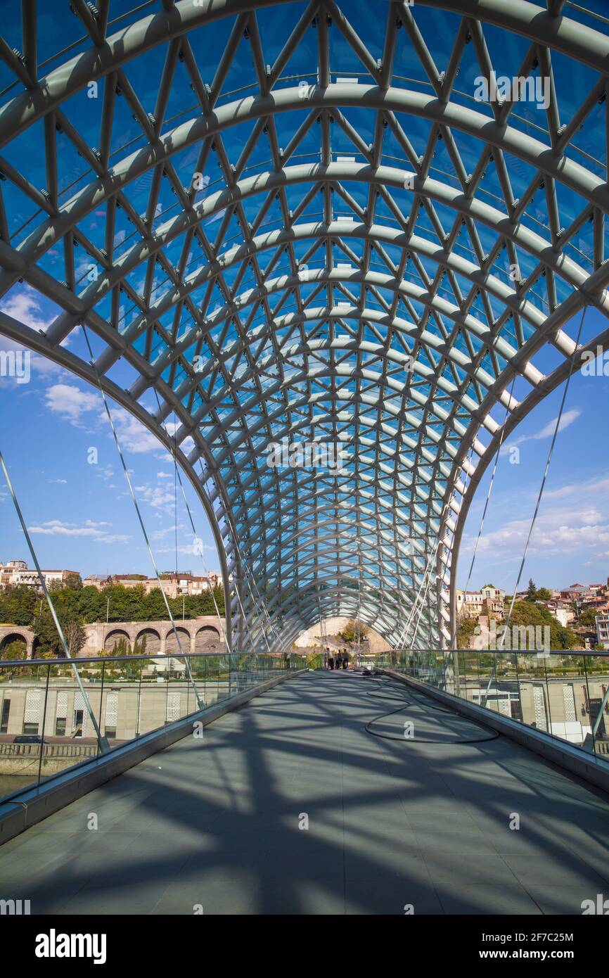Georgia, Tbilisi, Peace bridge over Mtkvari (Kura) river Stock Photo ...