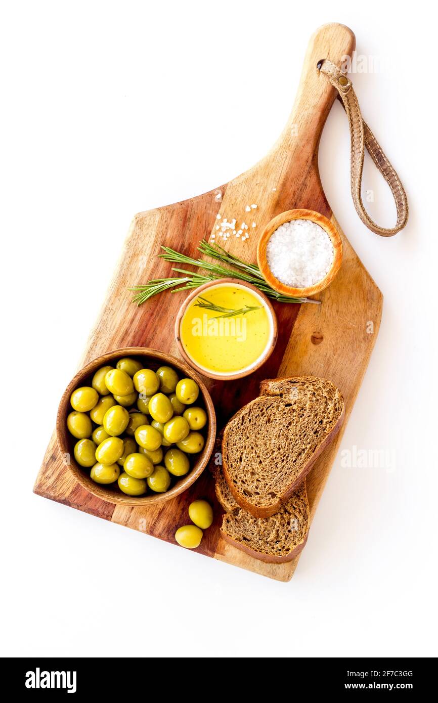 Italian food background with olives oil and sliced bread. Top view ...