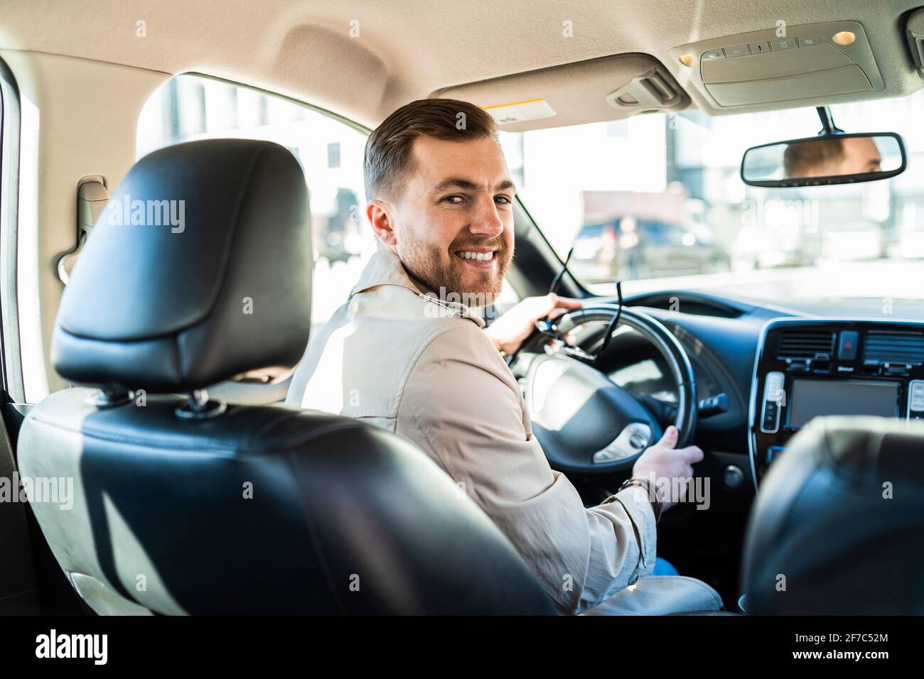 Driver looking back hi-res stock photography and images - Alamy