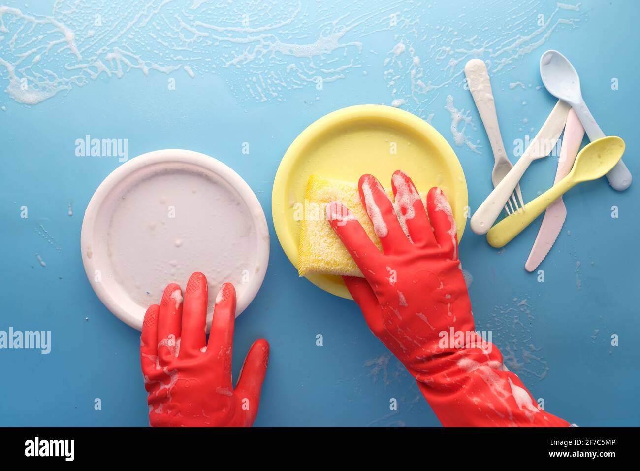 Man holding cleaning supplies hi-res stock photography and images - Alamy