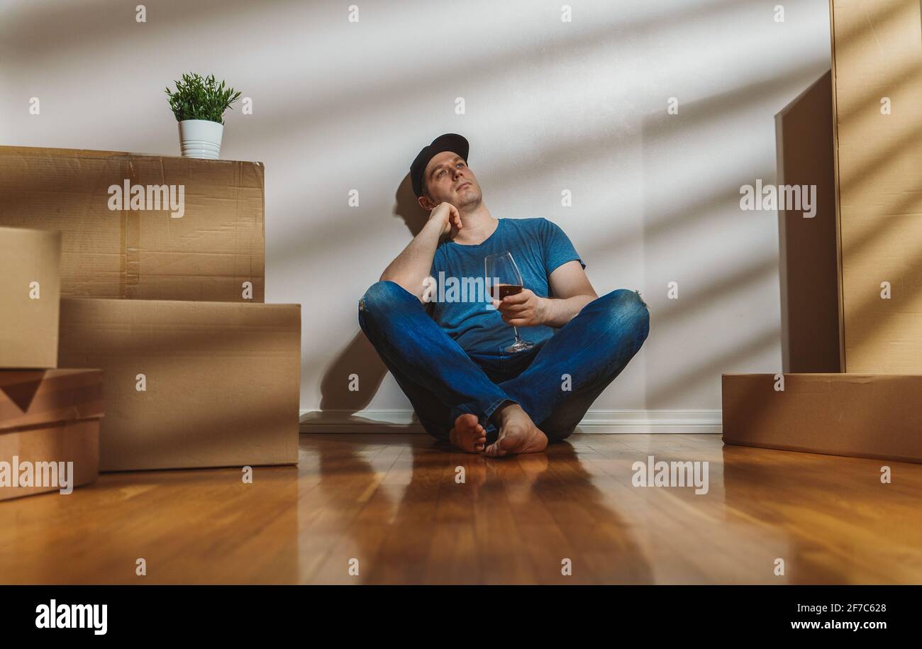 Tired delivery man box hi-res stock photography and images - Alamy