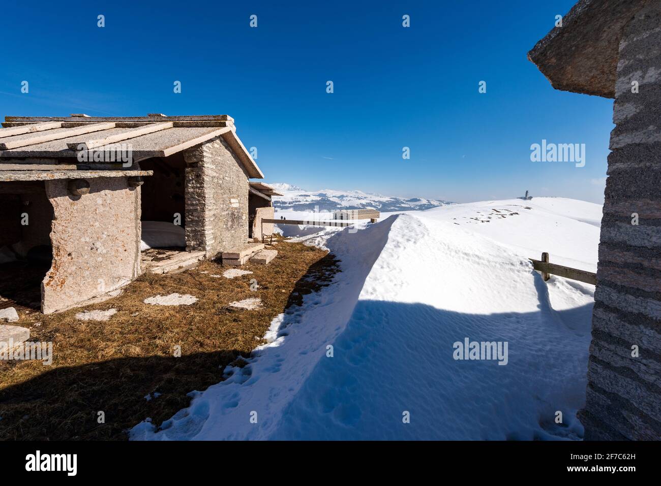 Typical ancient stone cow shed on Lessinia Plateau in winter with snow ...