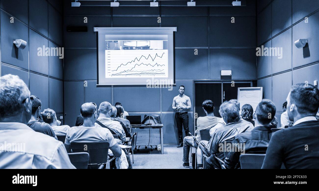 Business speaker giving talk at business conference event Stock Photo ...