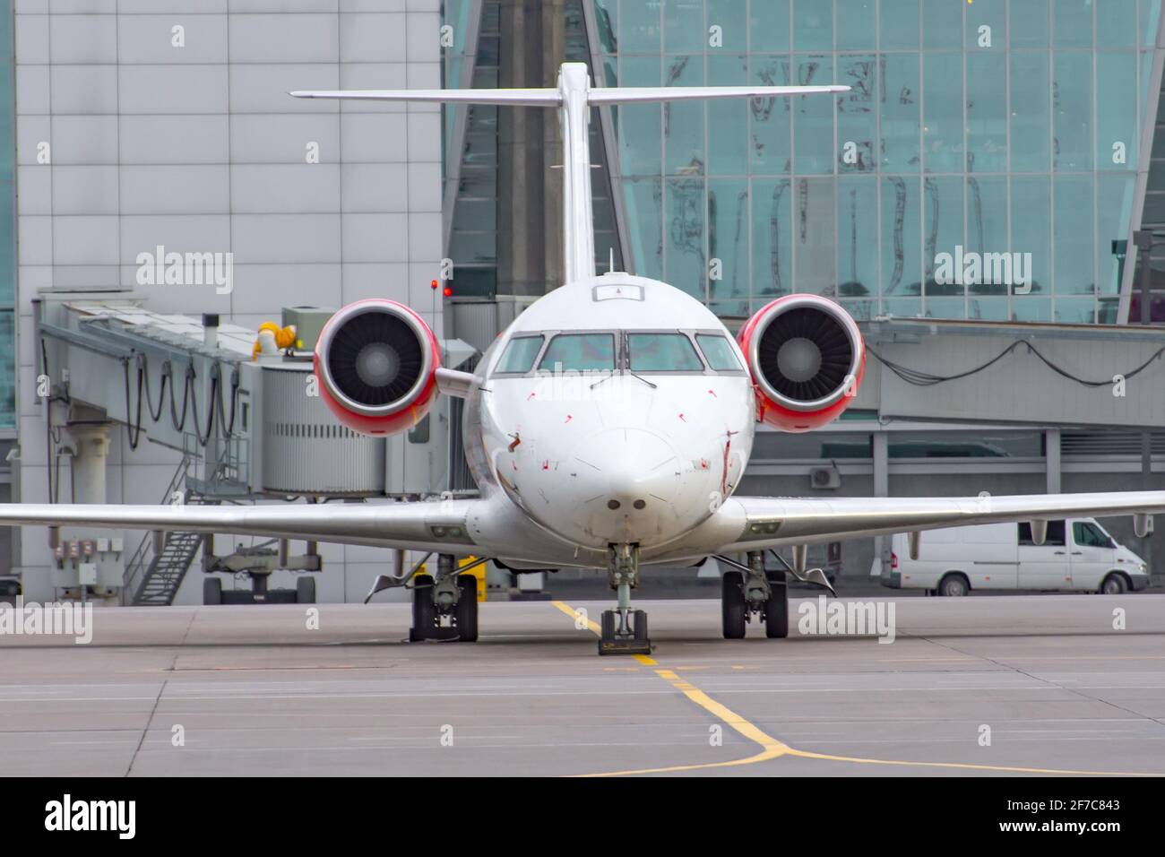Airplane wing with engine, view under the plane during flight service ...