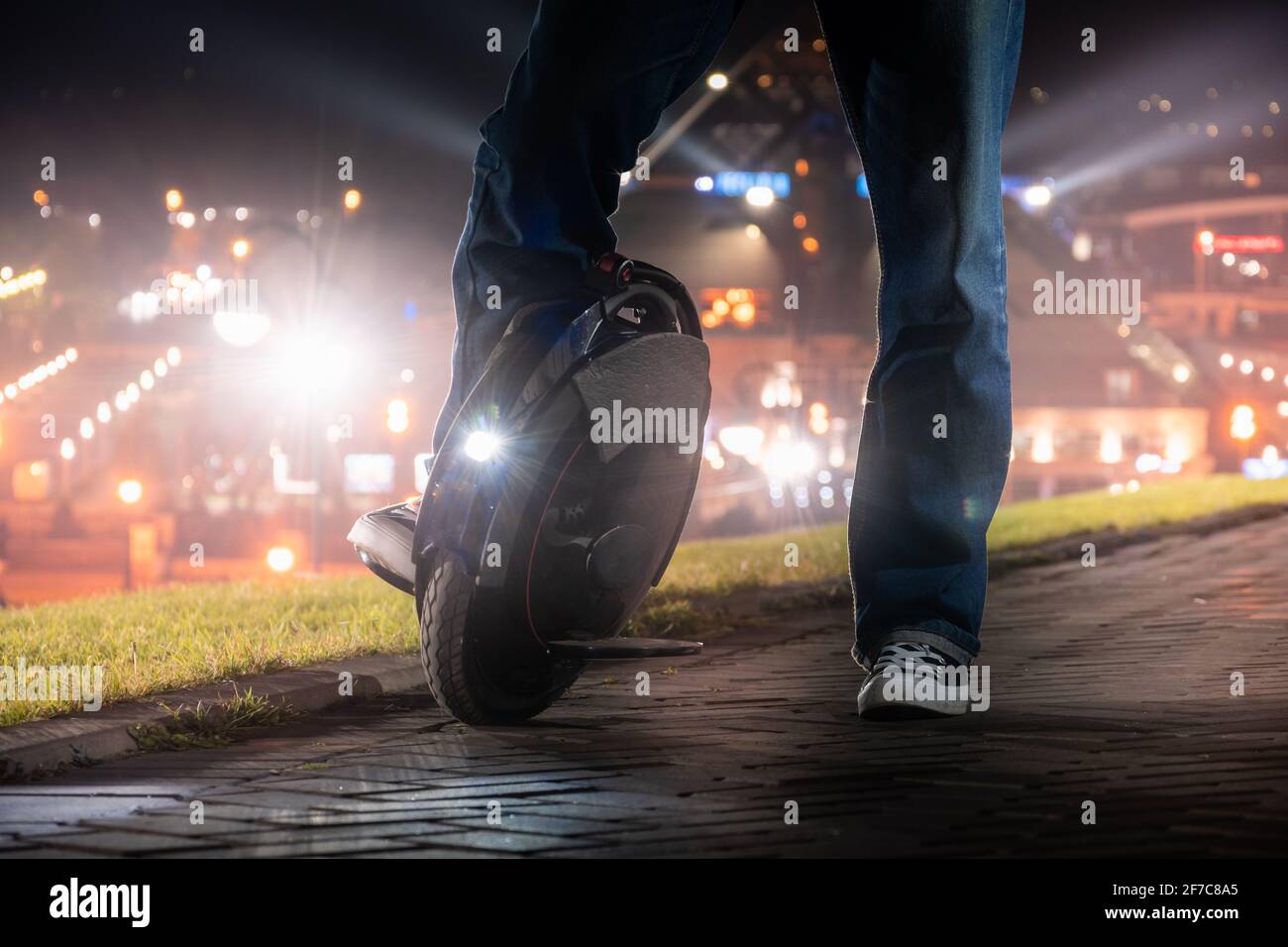 Person on electric unicycle hi-res stock photography and images - Alamy
