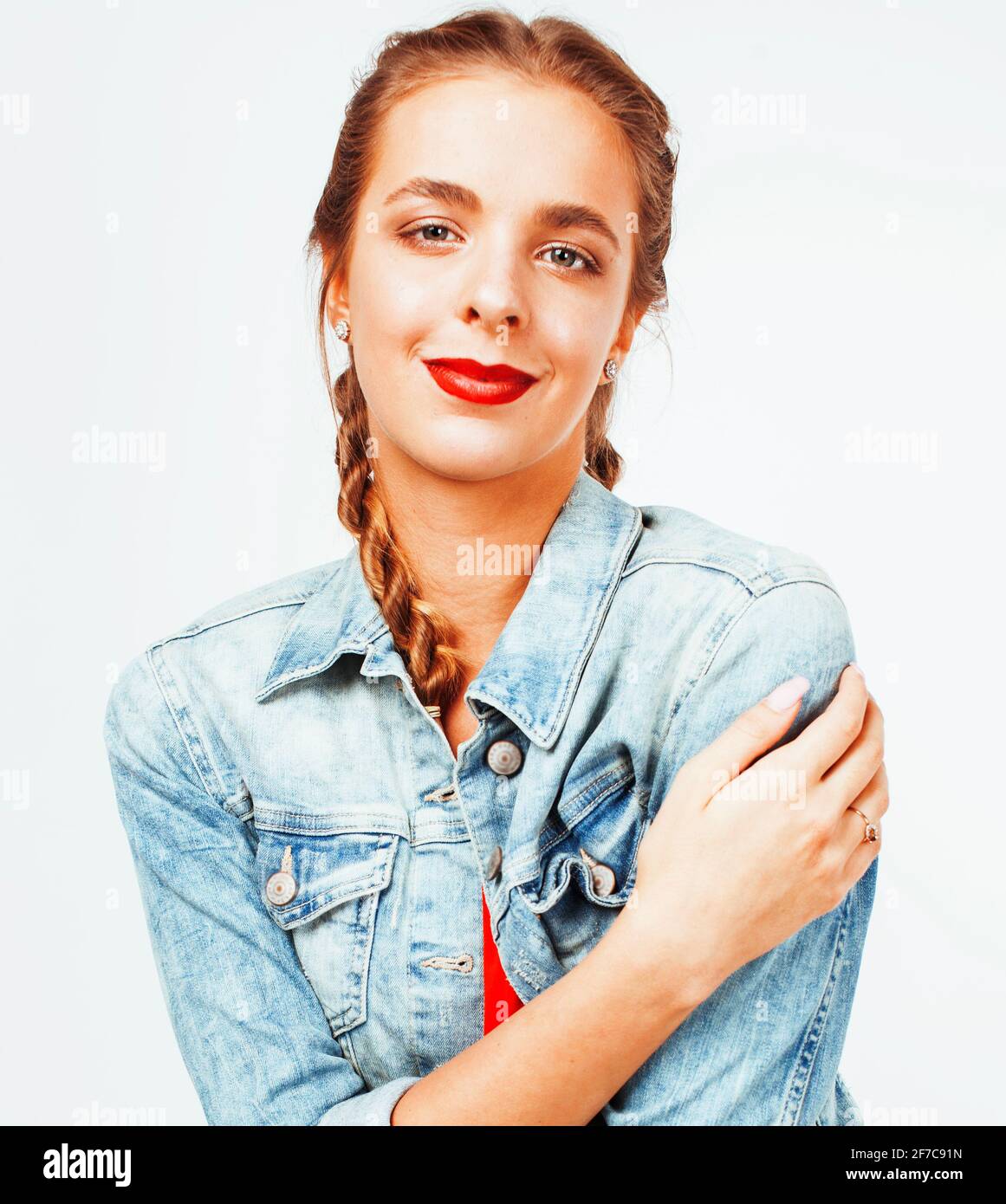 young pretty stylish blond hipster girl posing emotional isolated on ...