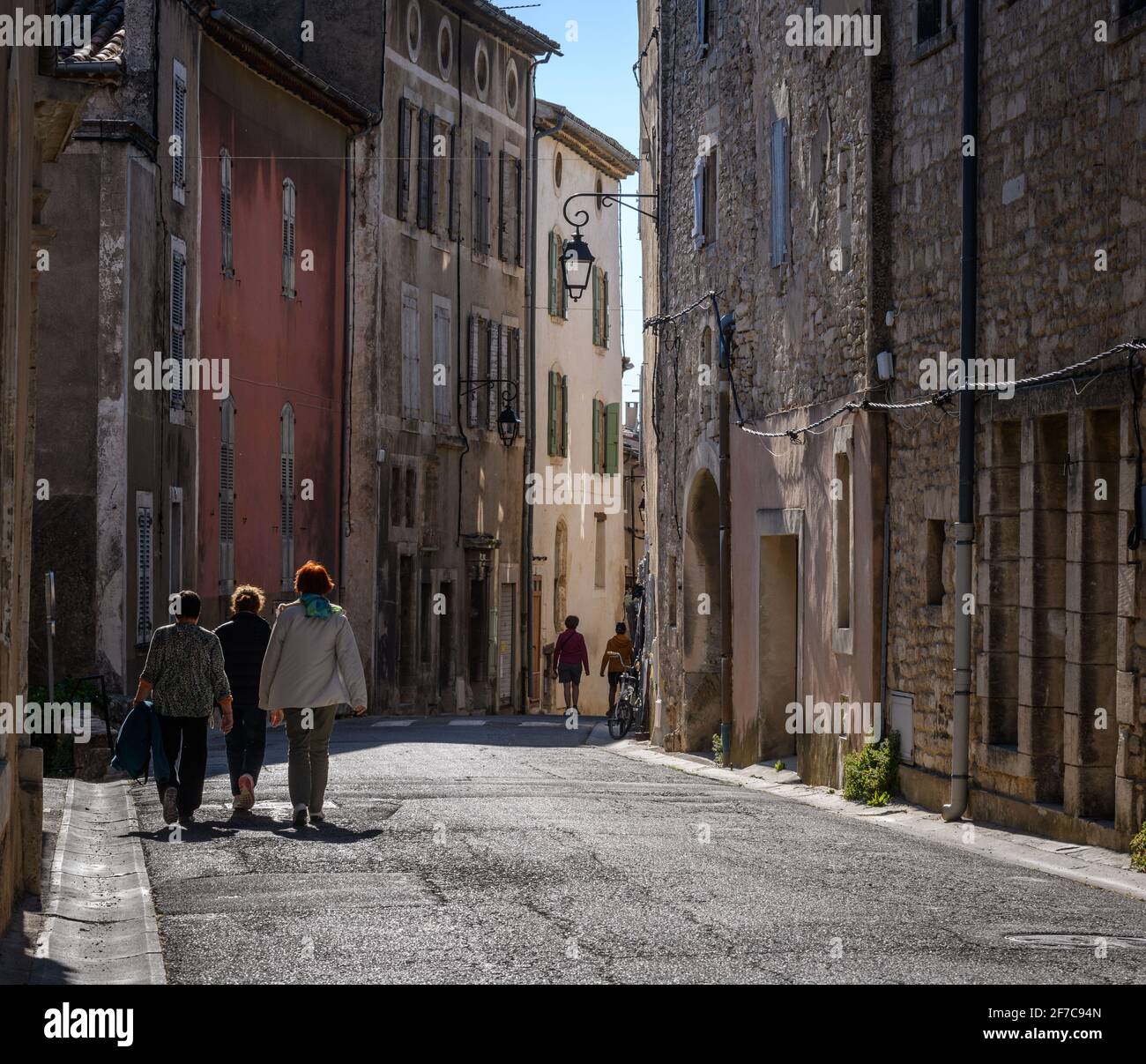Backlit image of old street in Provence Stock Photo - Alamy