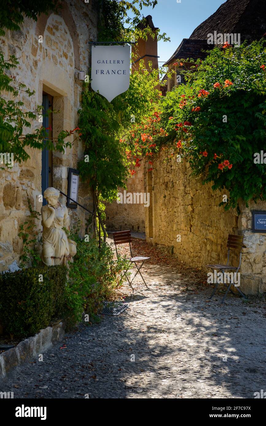 Quaint street scene in French village Stock Photo - Alamy