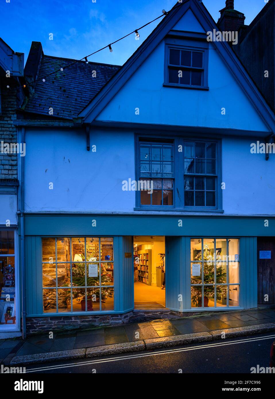 Old shop on street with warmly lit in winter Stock Photo - Alamy
