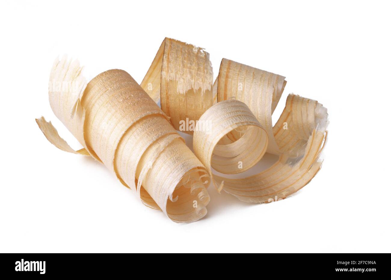 Wood shavings isolated on white background Stock Photo - Alamy