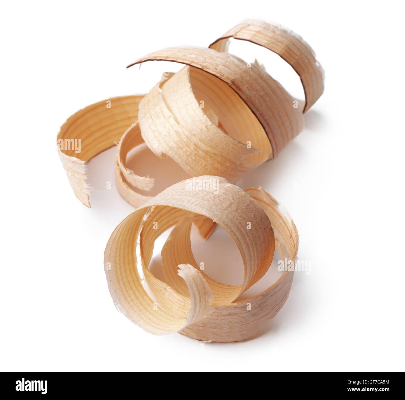 Wood shavings isolated on white background Stock Photo - Alamy