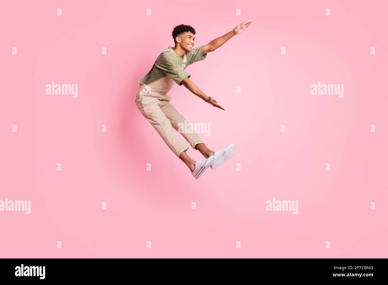 Full length body size side profile photo of guy flying back in windy ...