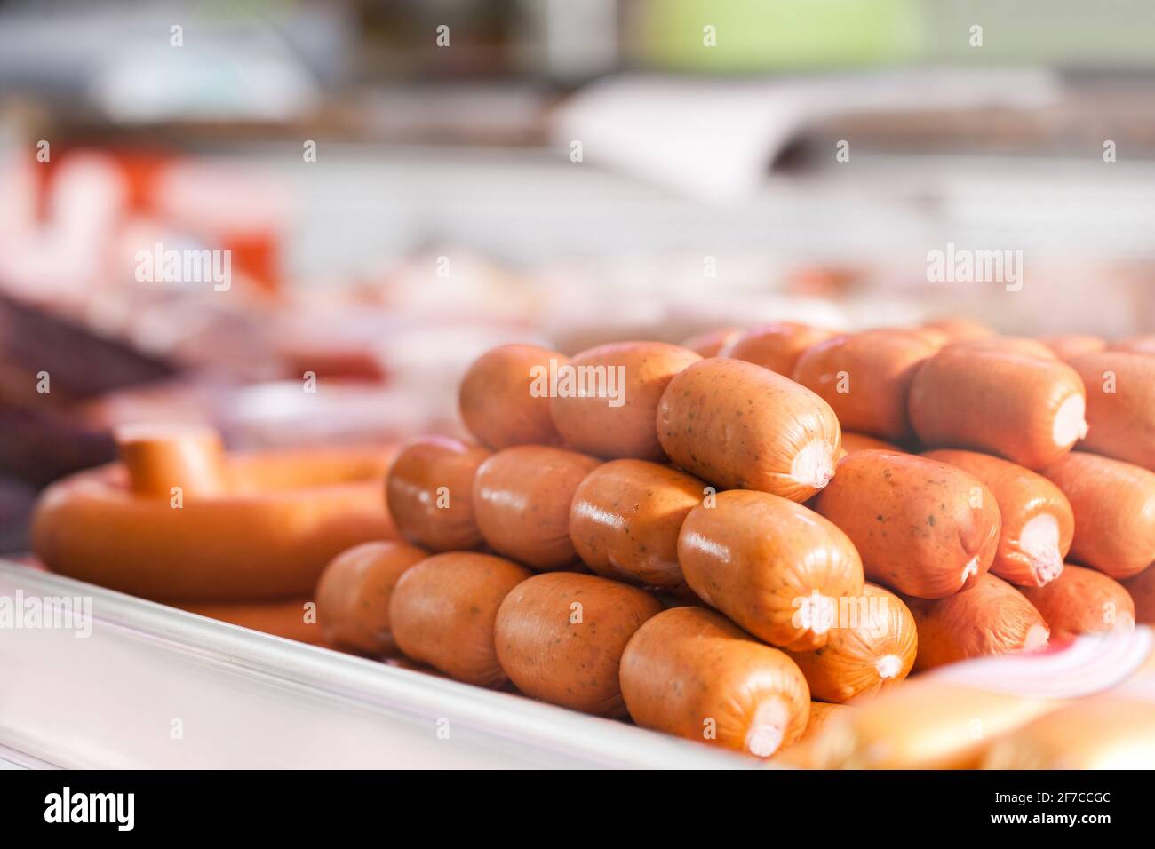 Display in a butchers shop - variety of bacon Stock Photo - Alamy