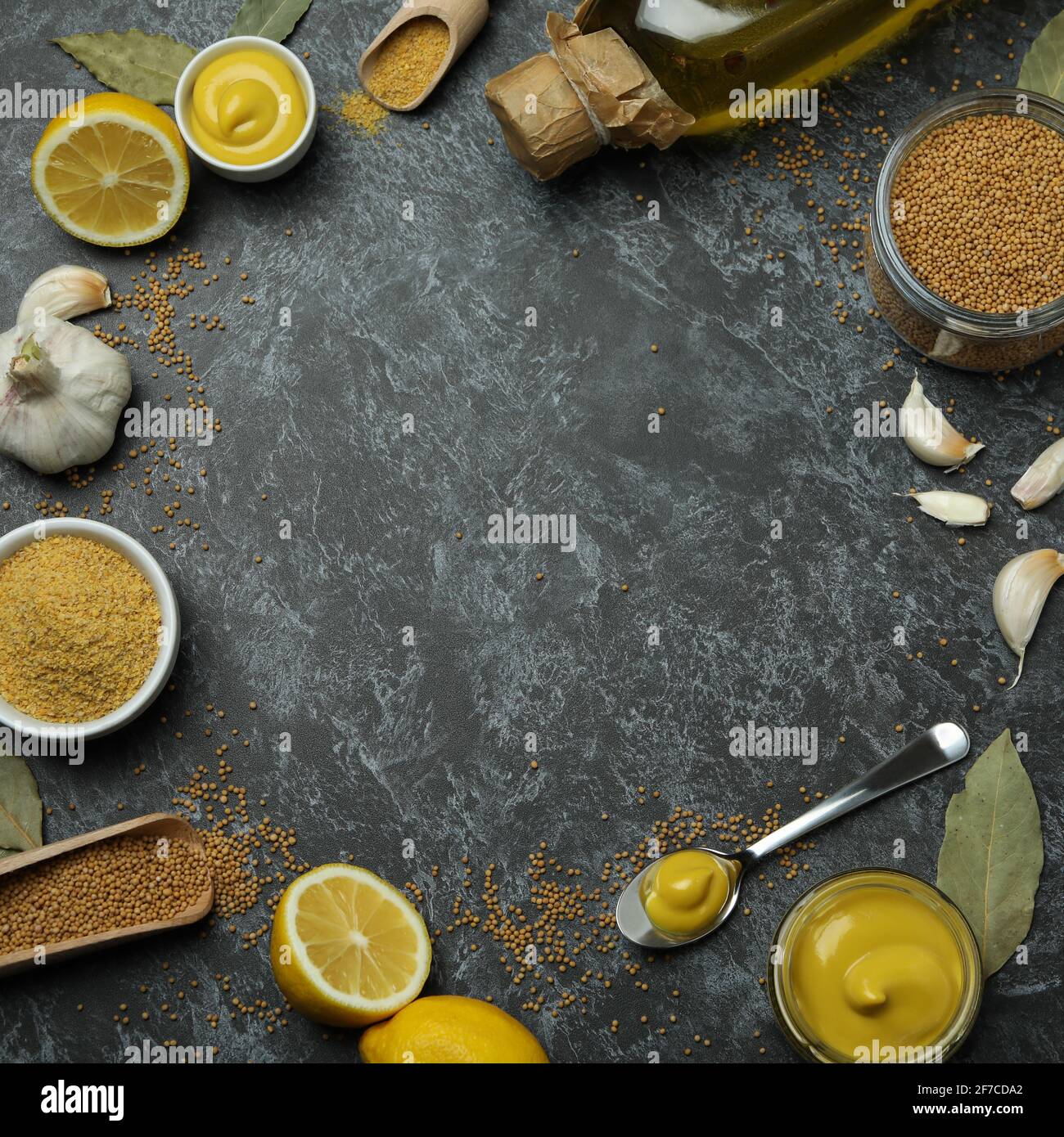 Concept of cooking mustard on black smoky background, space for text ...