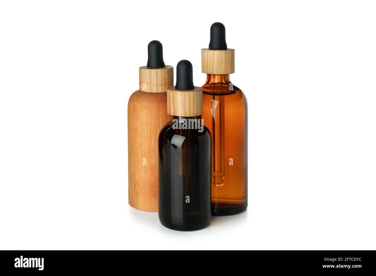 Dropper bottles with oil isolated on white background Stock Photo - Alamy